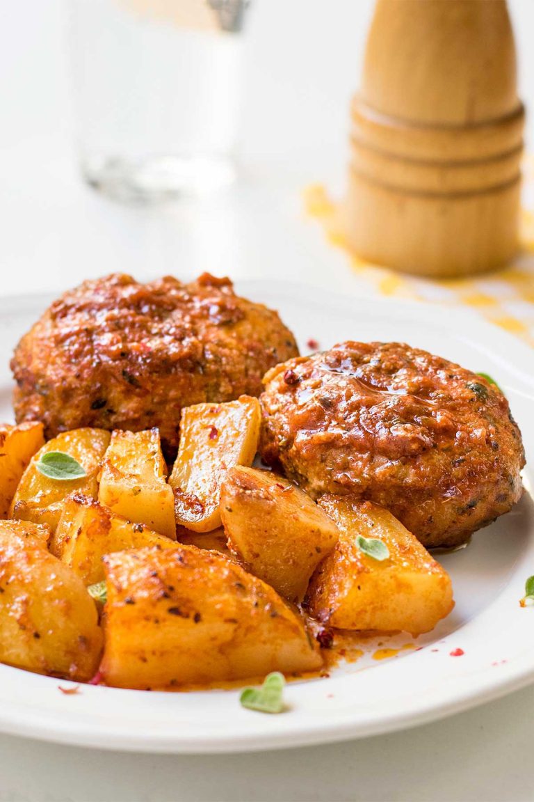 Oven baked Greek burgers (patties) and potatoes